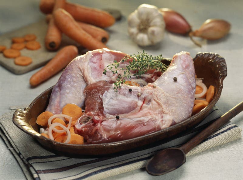 Guinea-fowl Legs with Carrots before Cooking Stock Image - Image of ...