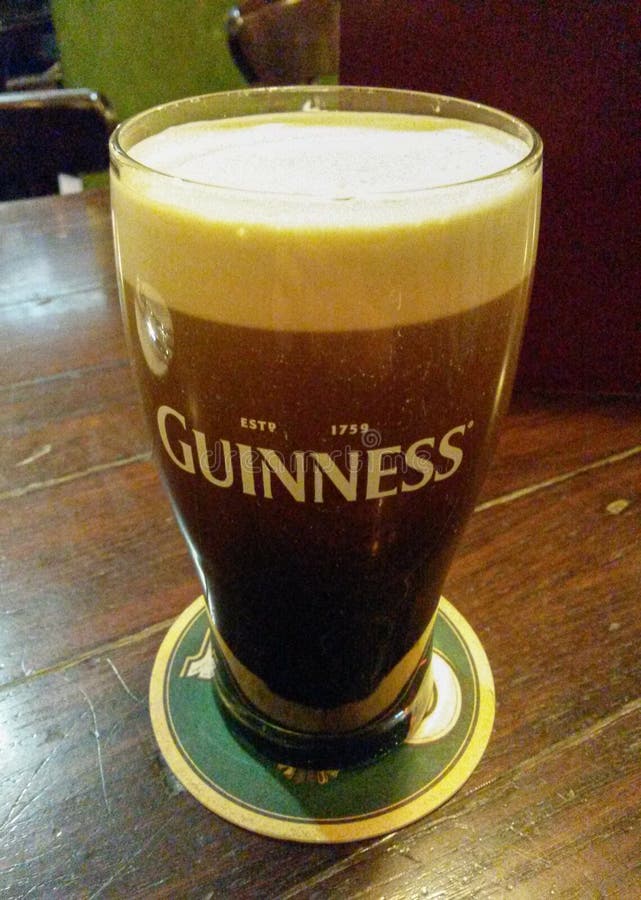 Pint of Guinness editorial stock photo. Image of pint - 18744348
