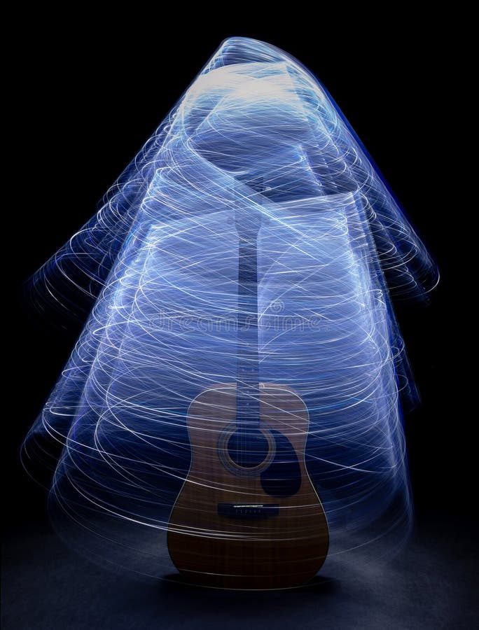 Guitar with Blue Light Spinning Around it. Stock Photo - Image of ...