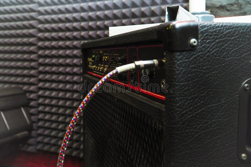 Guitar Combo Amplifier with Black Electric Guitar, Glass of Beer and ...