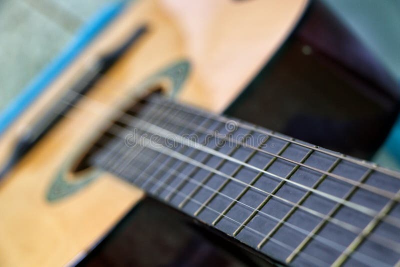 The Guitar is a Fretted Musical Instrument that Usually Has Six Strings ...