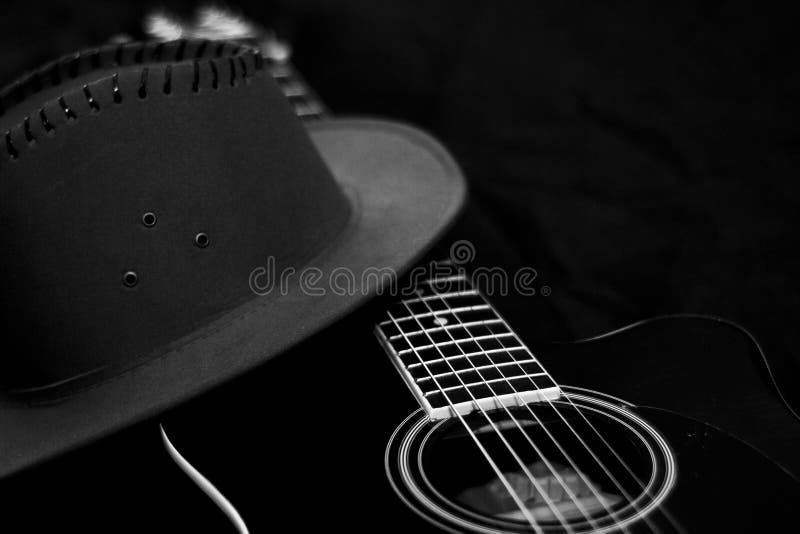 Guitar with hat stock image. Image of monochrome, gear - 78541137