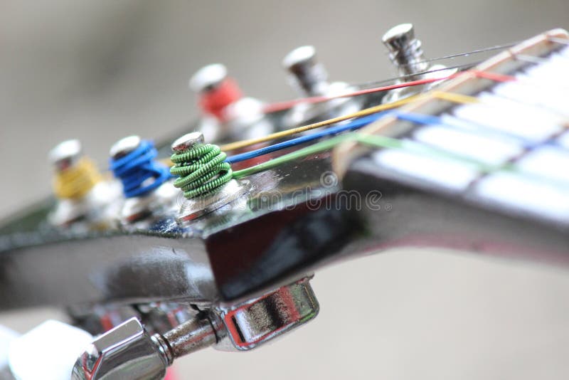 Guitar Head with Colored Strings Stock Image - Image of guitar, close ...