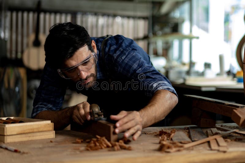 Guitar Making Process: Luthier Uses Planer on Neck Stock Photo - Image ...