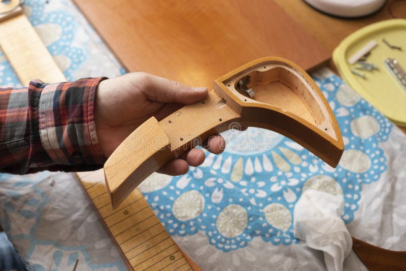 The Guitar Master Holds a Piece of Slide Guitar in His Hand Stock Image ...