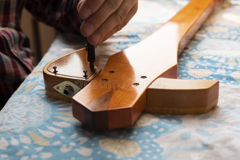 The Guitar Master Spins the Tone Control Panel on an Electric Slide ...
