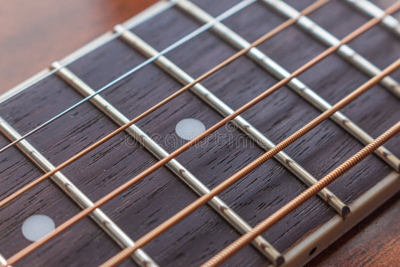 Guitar Neck, Stretched Strings, Frets and Texture of Natural Material ...