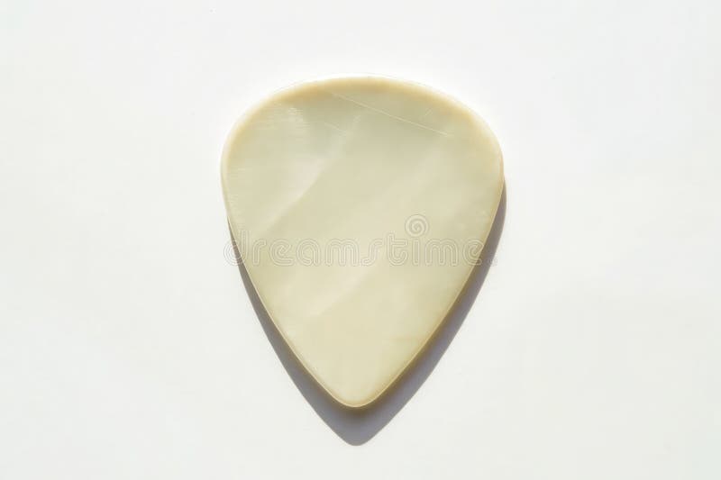 Guitar Pick Isolated on White Background Showing Detailed Texture and ...