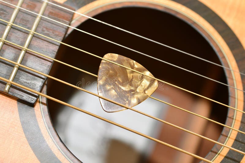 Guitar and pick stock image. Image of entertain, classical - 52172055