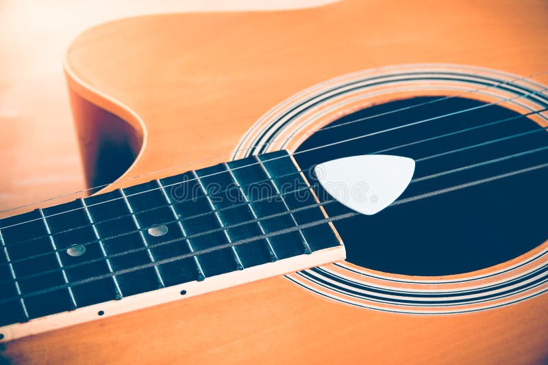 Guitar and plectrum stock photo. Image of folk, song - 88681904