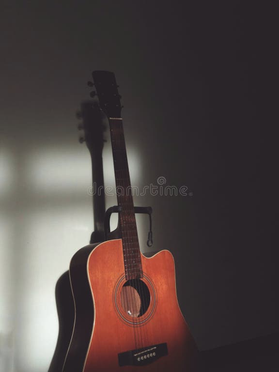 Guitar Shadow in the Morning Editorial Stock Photo - Image of saddow ...