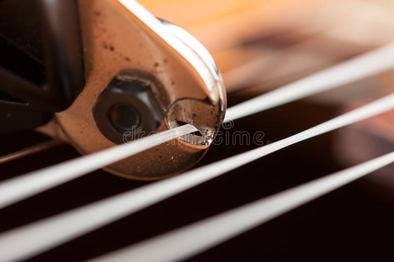 Guitar String Cutting Equipment Isolated on White Background Stock ...