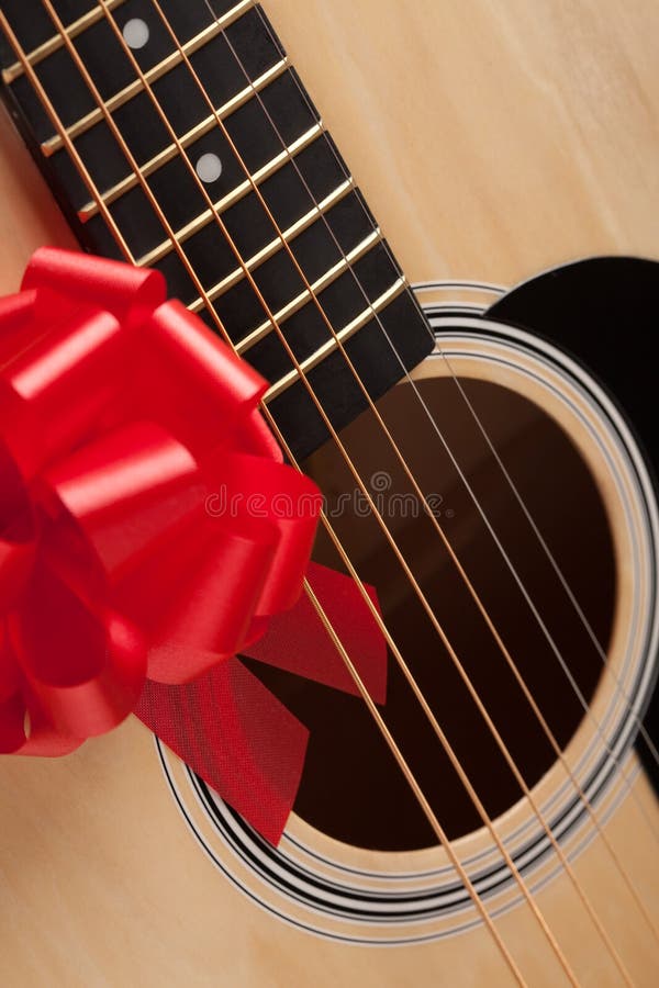 Guitar Strings with Red Ribbon Stock Photo - Image of macro, beauty ...
