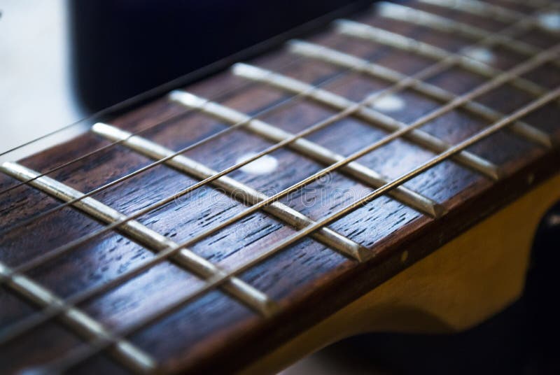 Guitar Strings on a Wooden Neck Closeup Stock Photo - Image of musical ...