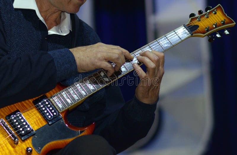 Guitarist Hands Playing the Guitar Using Tapping Technique Stock Photo ...