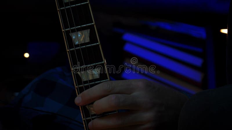 Guitarist Playing on Guitar Strings. Musician Playing on Guitar ...