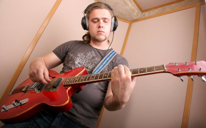 Guitarist in studio stock image. Image of instrument, finger - 6365509