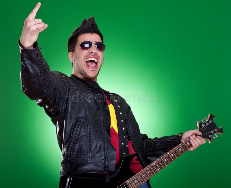 Guitariste Effectuant Un Geste De Roche Photo stock - Image du punk ...