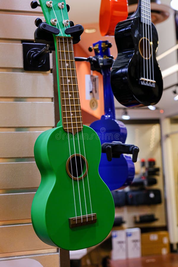 Guitars on Display in Music Instruments Store in a Mall Stock Photo ...