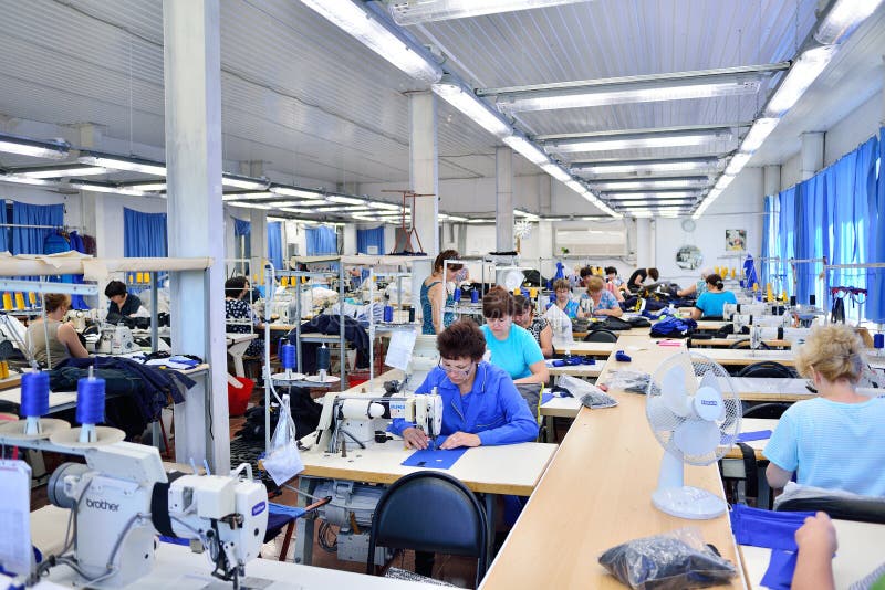 GUKOVO, RUSSIA - SEPTEMBER, 2016: Workers Work in a Garment Editorial ...