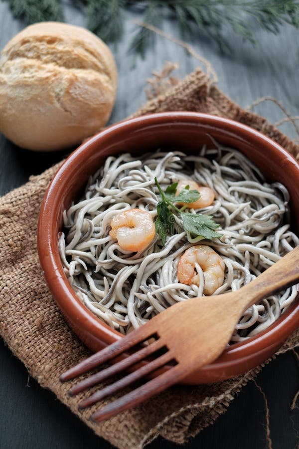 Gulas with Garlic and Prawns Stock Photo - Image of appetizer, bread ...