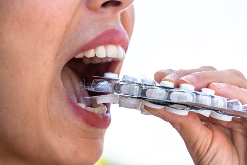 Gulping down pills stock image. Image of female, cure - 155938567