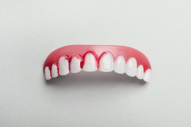 Gum Model with Blood on Teeth Against White Background, Top View Stock ...