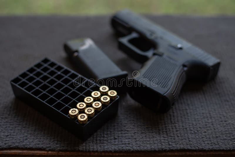 Gun and bullet stock image. Image of black, firearm - 134515521
