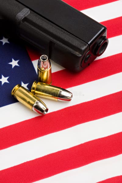 Gun and bullets on flag stock photo. Image of patriotic - 4992272