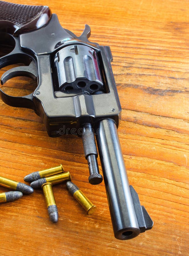 Gun with bullets stock photo. Image of revolver, weapon - 30819540