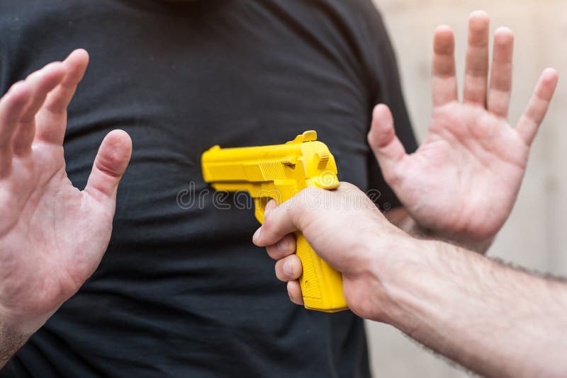 Gun Disarm. Self Defense Techniques Against a Gun Point. Stock Photo ...