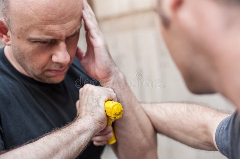Gun Disarm. Self Defense Techniques Against a Gun Point. Stock Photo ...