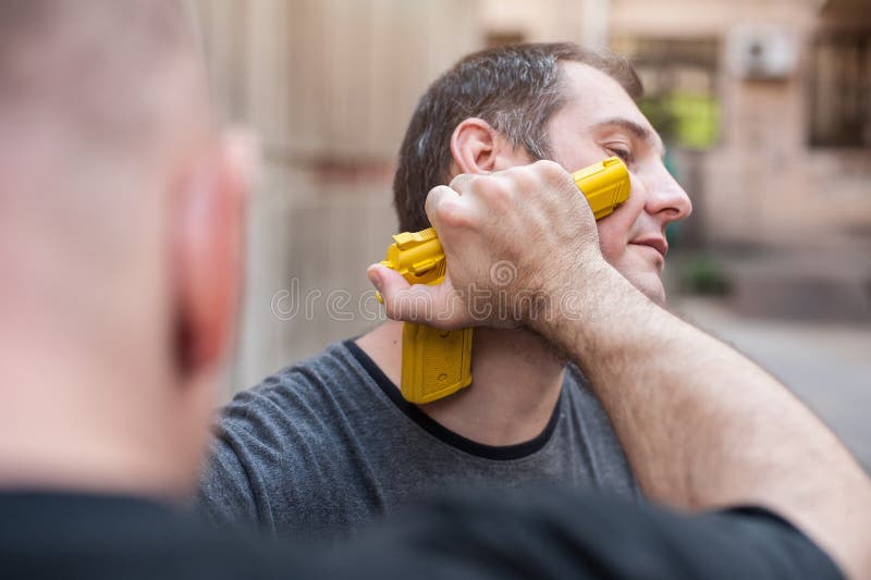 Gun Disarm. Self Defense Techniques Against a Gun Point. Stock Photo ...