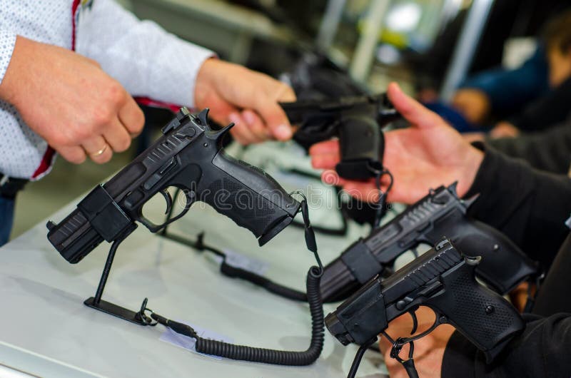 Gun Display Stands. Pistols for Sale in the Store Stock Image - Image ...