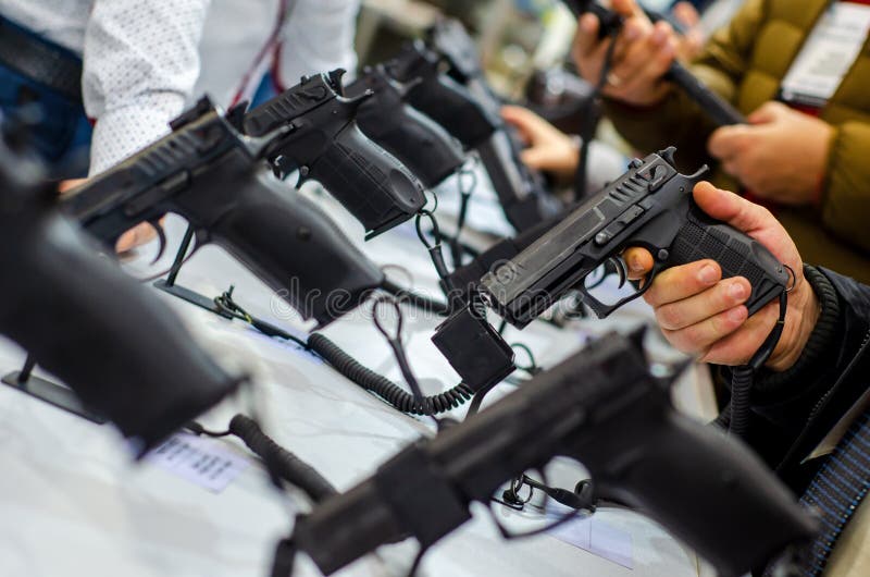 Gun Display Stands. Pistols for Sale in the Store Stock Image - Image ...