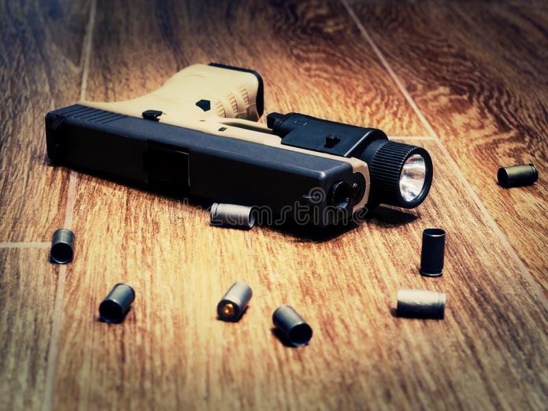 The gun on the floor stock image. Image of armament, shooting - 68324895