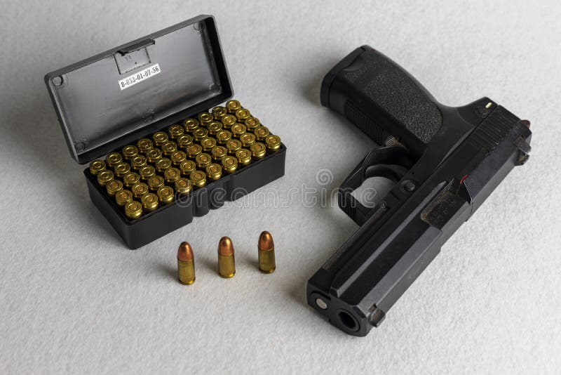 Gun and Group of Bullets or Ammunition and after Shoot ,before Clean ...