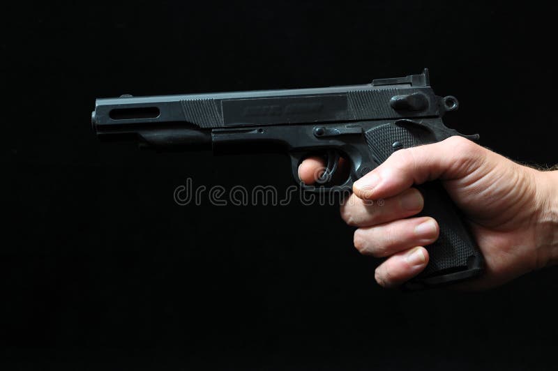 Gun and a Hand stock image. Image of kill, holding, metal - 33792583