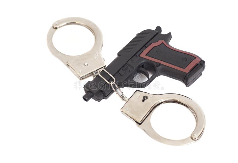Gun and handcuffs stock image. Image of isolated, closed - 56683509