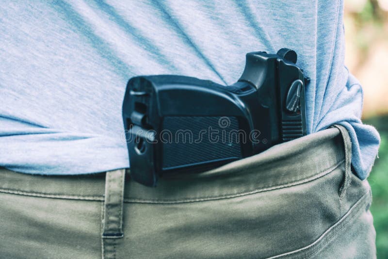 The Gun is Hidden Behind Man`s Back Stock Photo - Image of casual ...