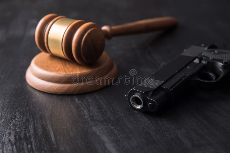 Gun and judge gavel stock photo. Image of justice, gavel - 219968044