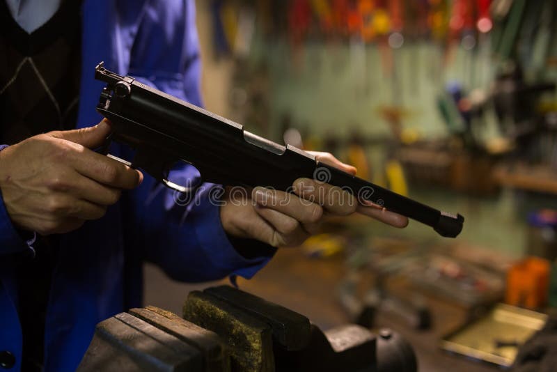 Gun Repairman Disassembling Sporting Handgun before Preventive ...