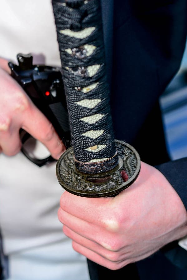 Gun and samurai sword stock photo. Image of firearm, colt - 47134554