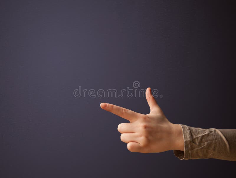 Gun shaped woman hand stock photo. Image of shooting - 39610748