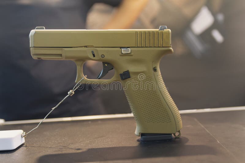 Gun on a showcase close up stock image. Image of dangerous - 170141171