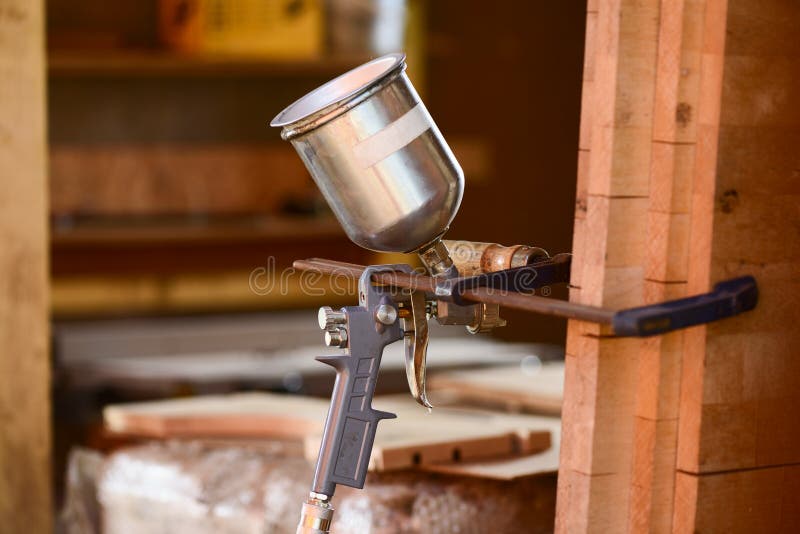 Gun Spray in Carpenter Workshop Stock Photo - Image of wooden ...
