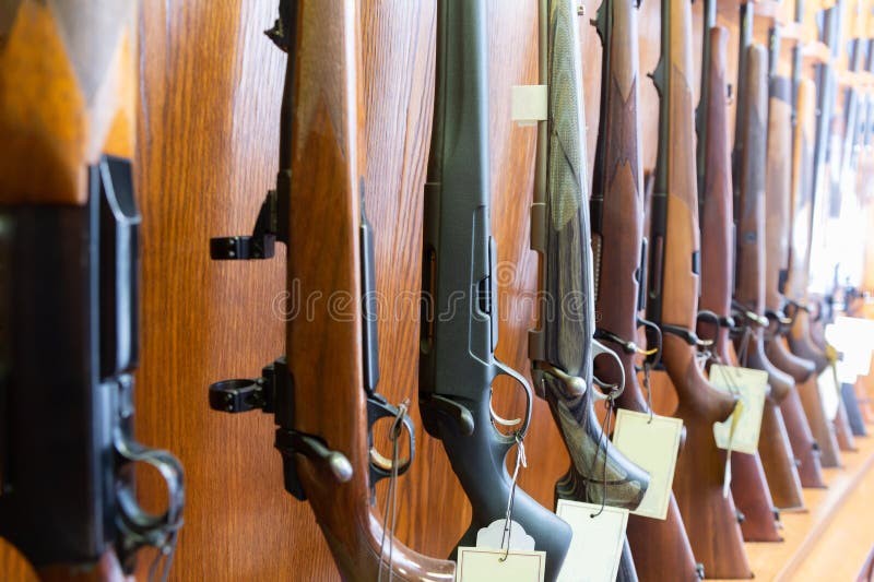 Gun Store Interior with Rifles on Showcase Editorial Image - Image of ...