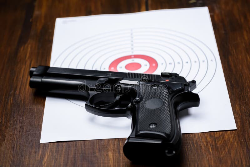 Gun & shield stock photo. Image of replica, handgun - 218654930
