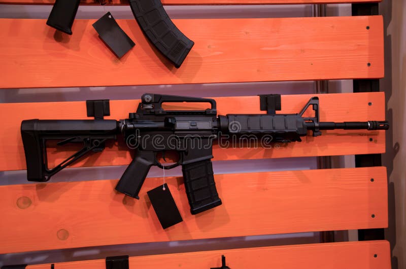 Gun wall rack with rifles stock photo. Image of rack - 141018474