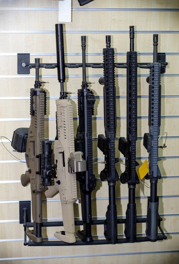 Gun wall rack with rifles stock image. Image of arsenal - 140870843